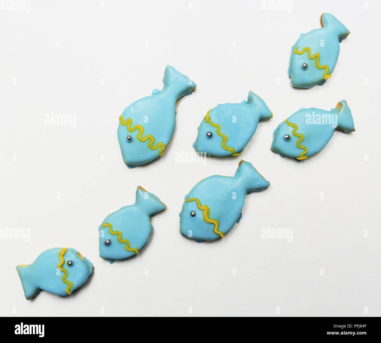 Blue fish-shaped biscuits Stock Photo - Alamy
