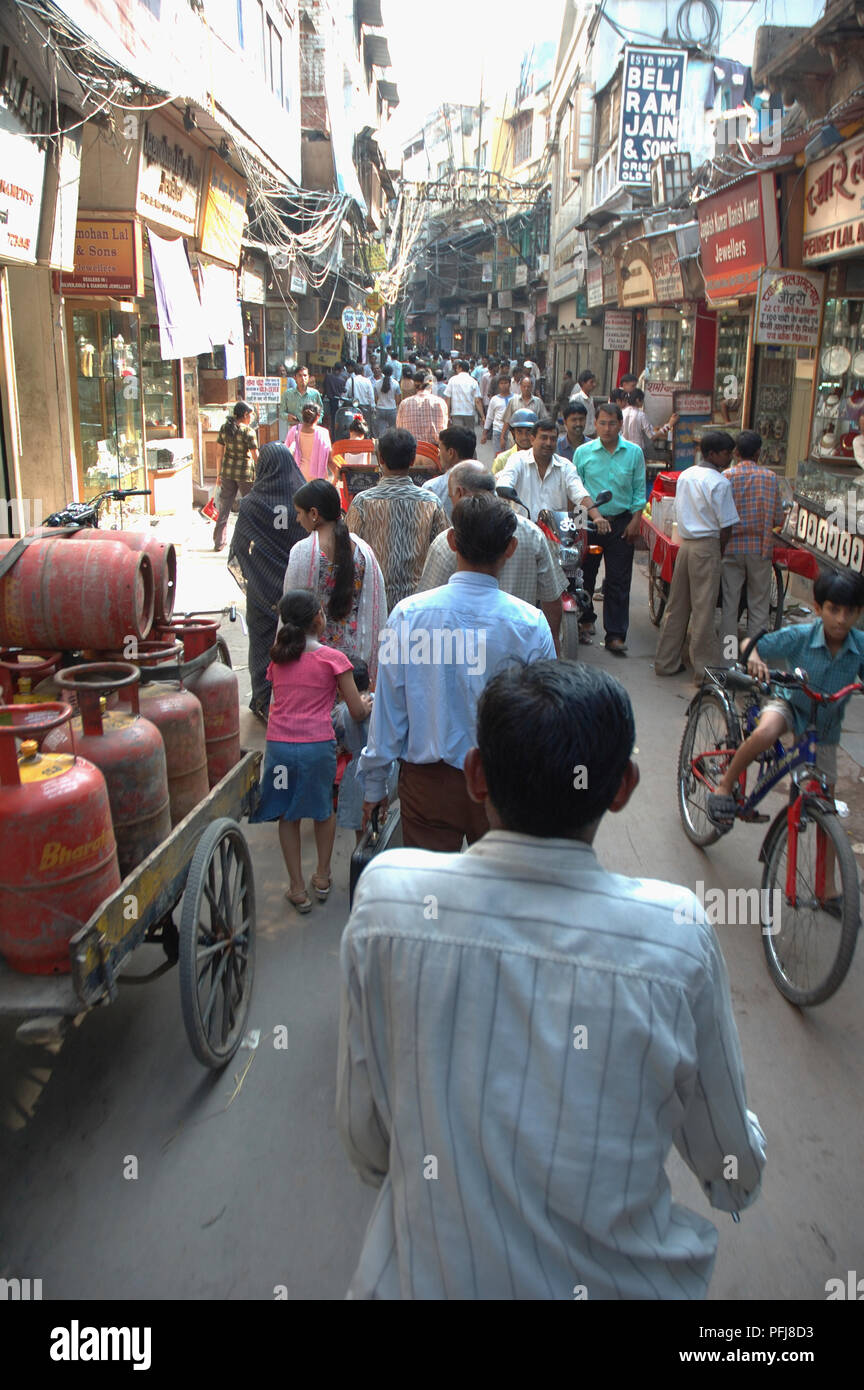 South Asia, India, Delhi, people walking up and down a busy narrow ...