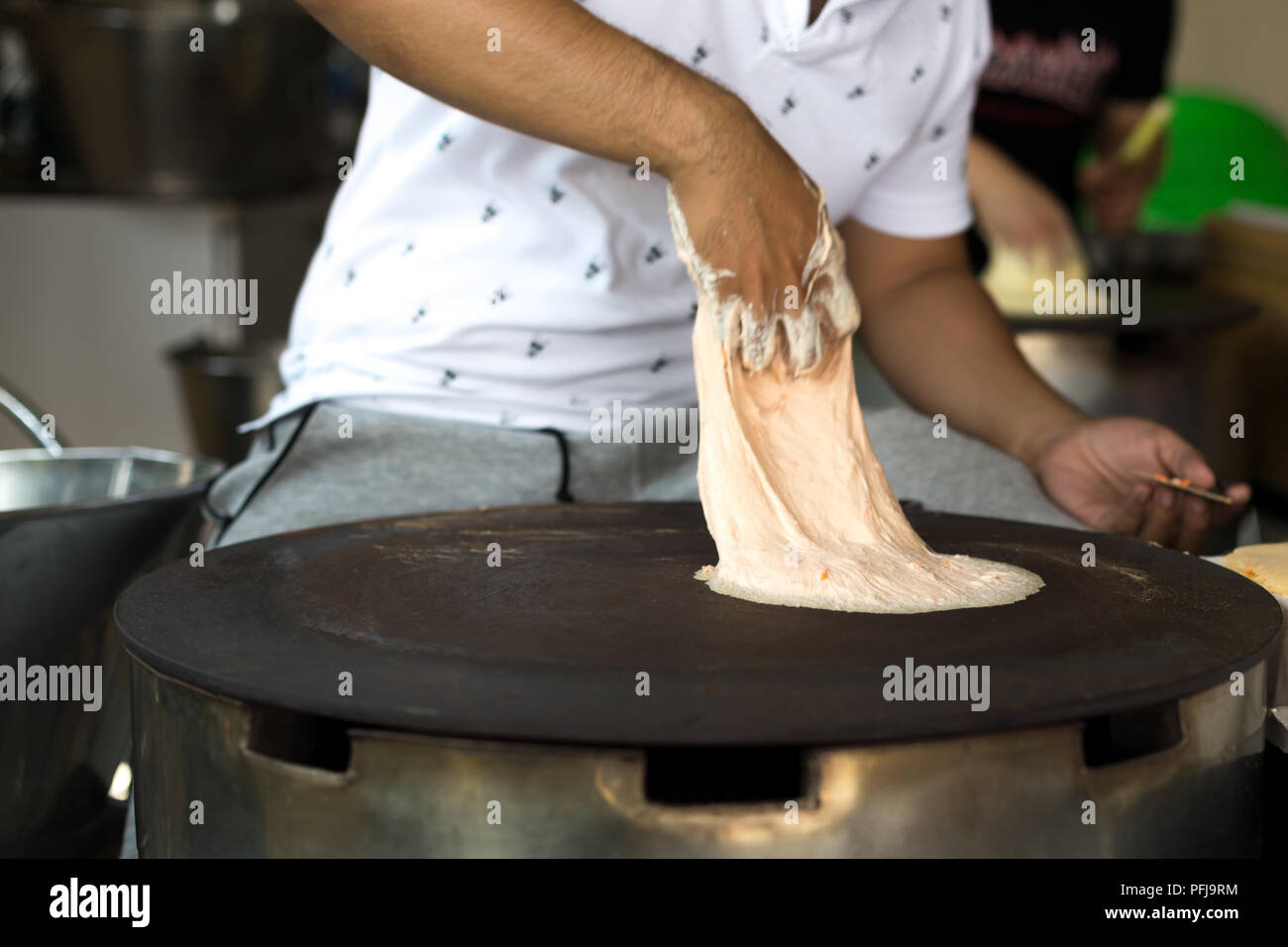 Roti on hot pan street hi-res stock photography and images - Alamy