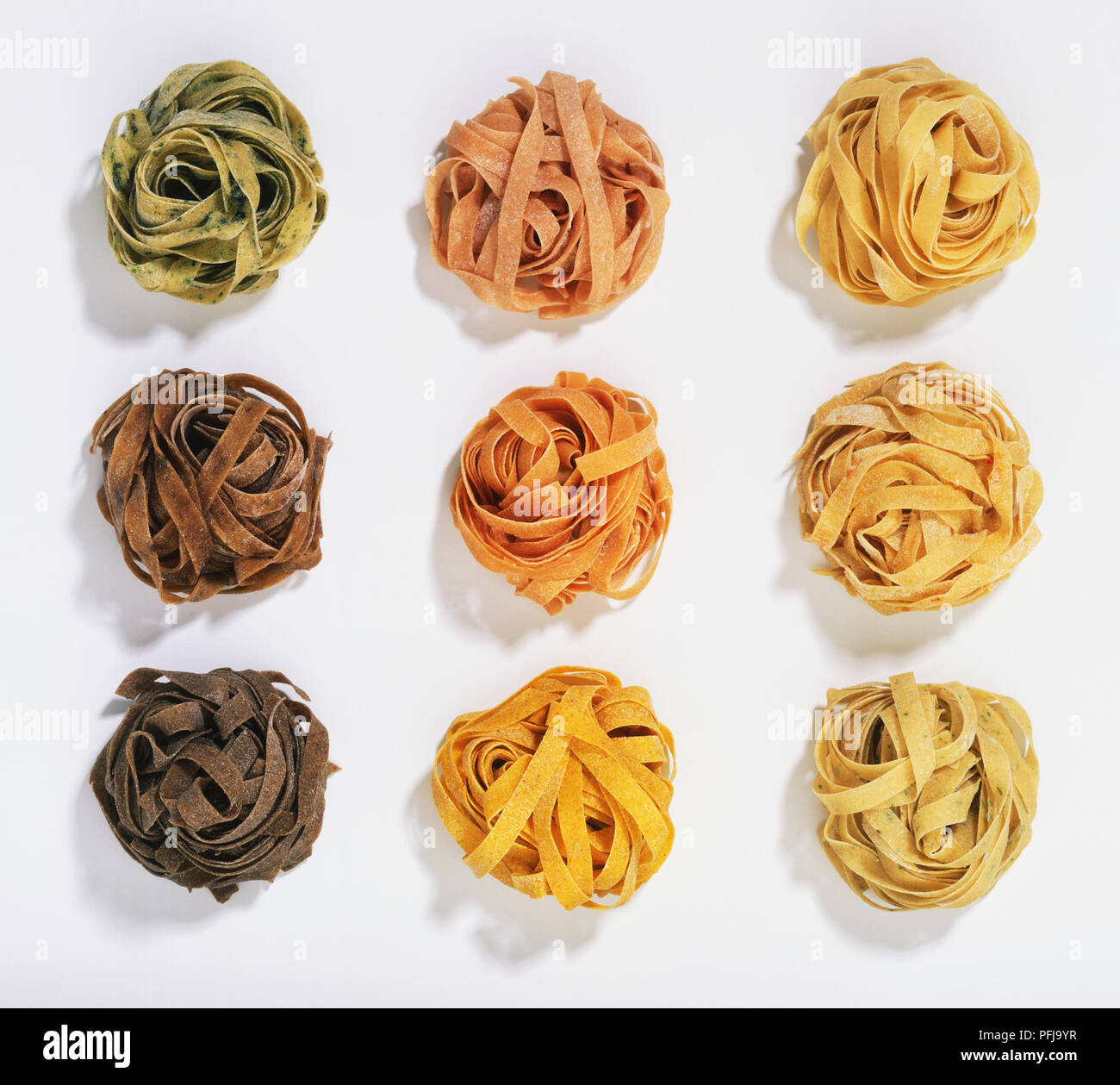 Nine pasta nests, different flavours Stock Photo - Alamy
