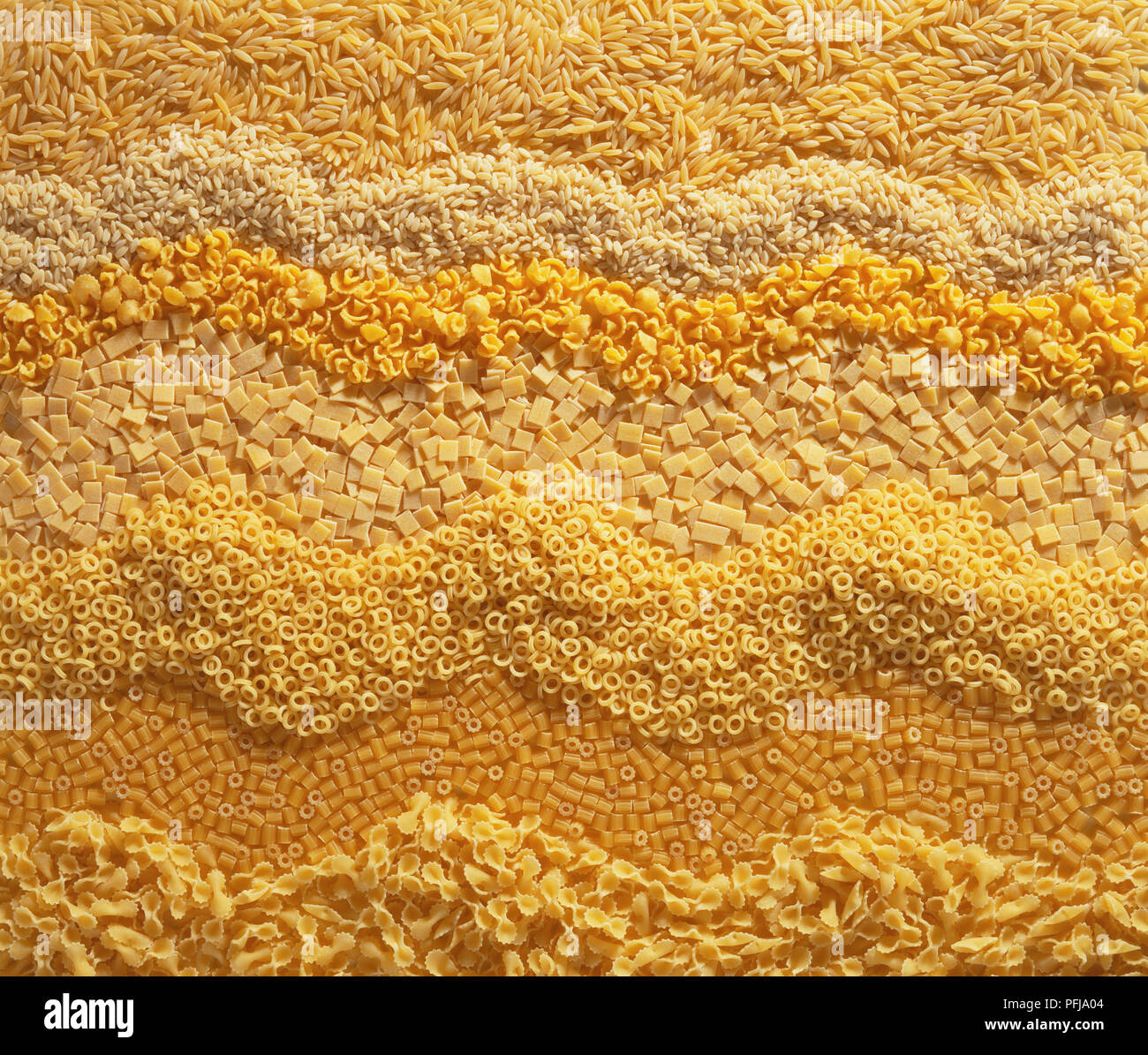 Types of small pasta arranged in layers Stock Photo - Alamy