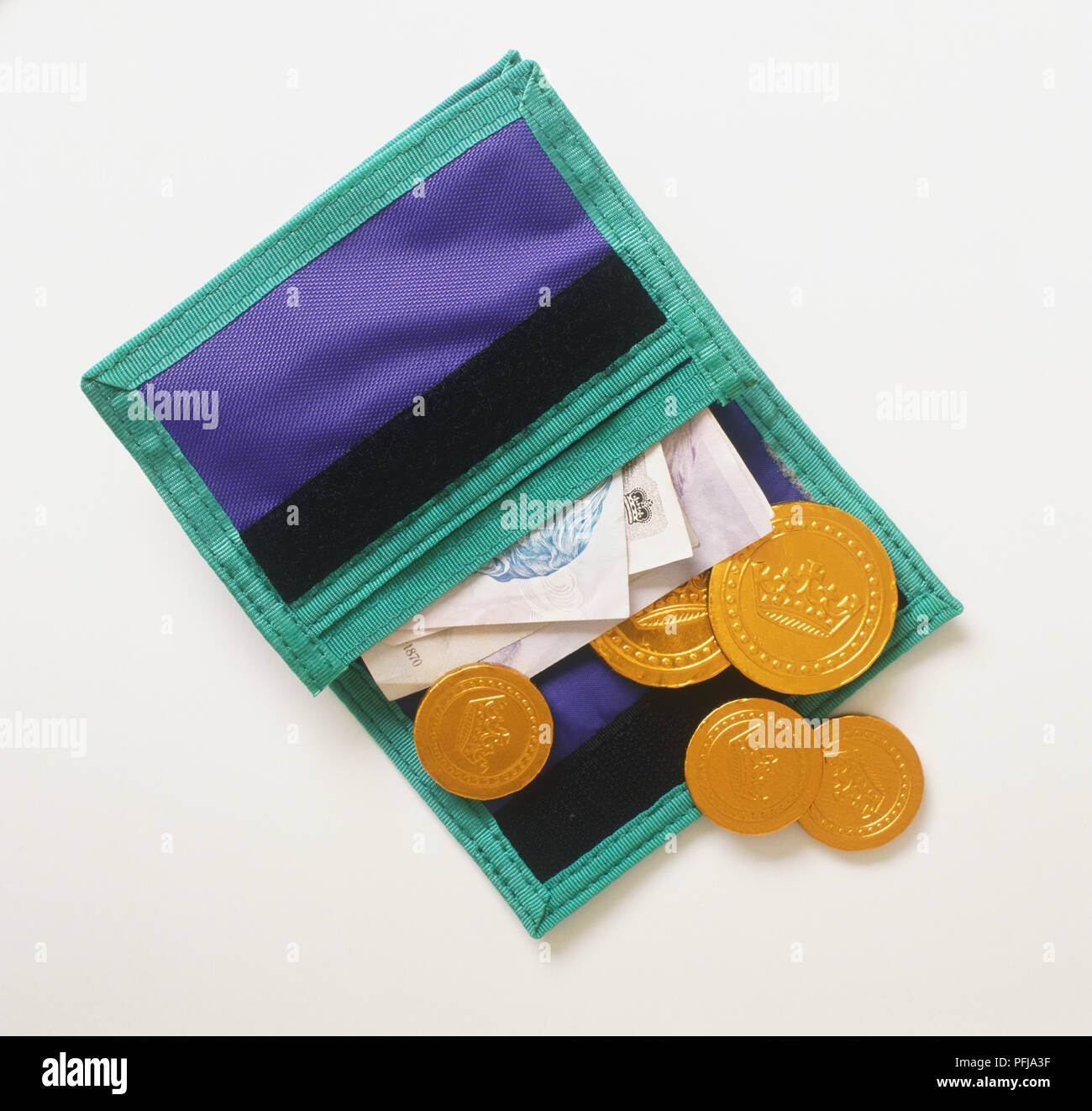 Toy money and banknotes in open wallet Stock Photo - Alamy