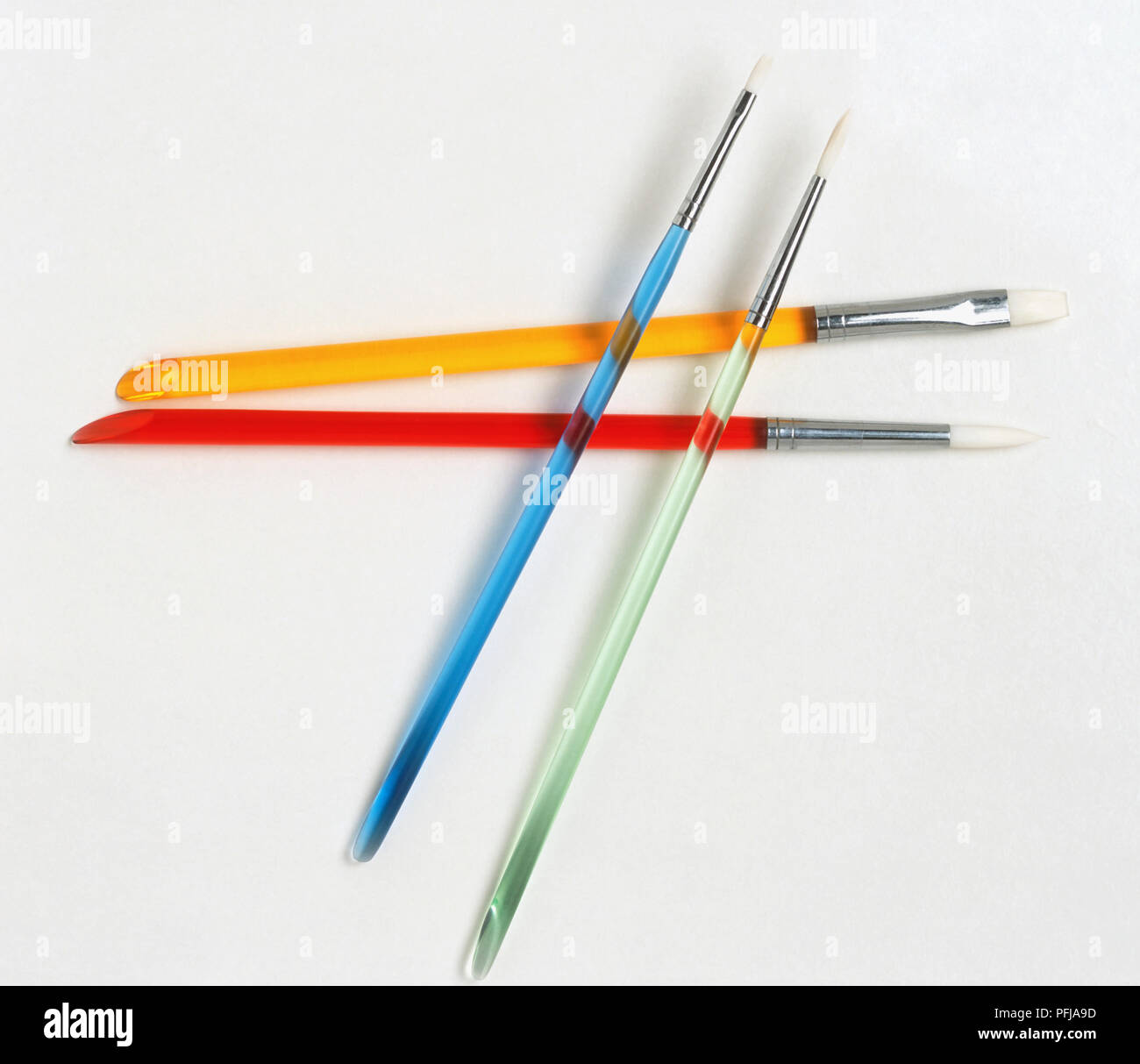 Four paint brushes Stock Photo - Alamy