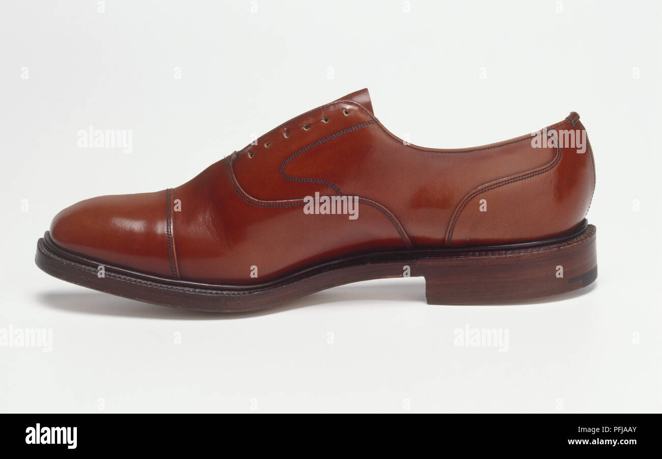 Red-brown leather men's shoe, side view Stock Photo - Alamy