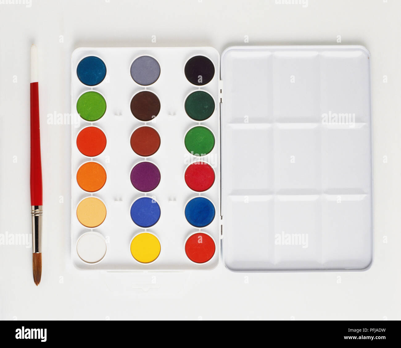 Watercolour paint box and brush Stock Photo - Alamy