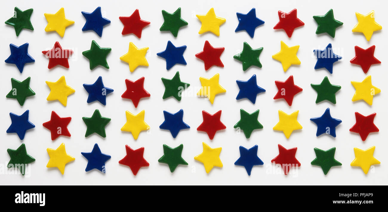 Multi-coloured stars arranged in rows, blue, red, green and yellow ...