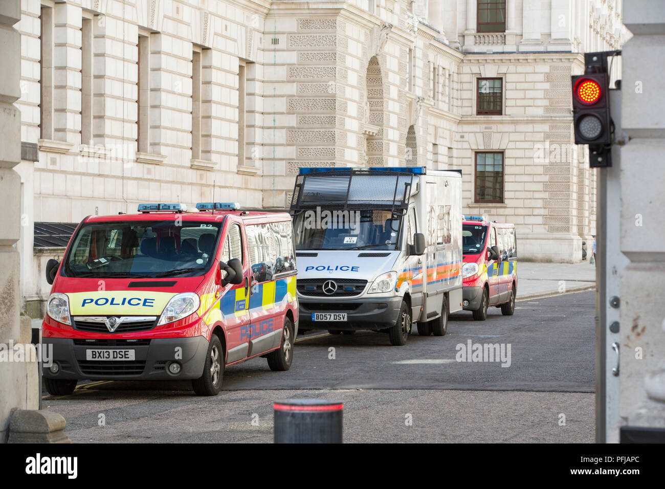 Police vehicles and security guards in Whitehall, London, UK Stock ...