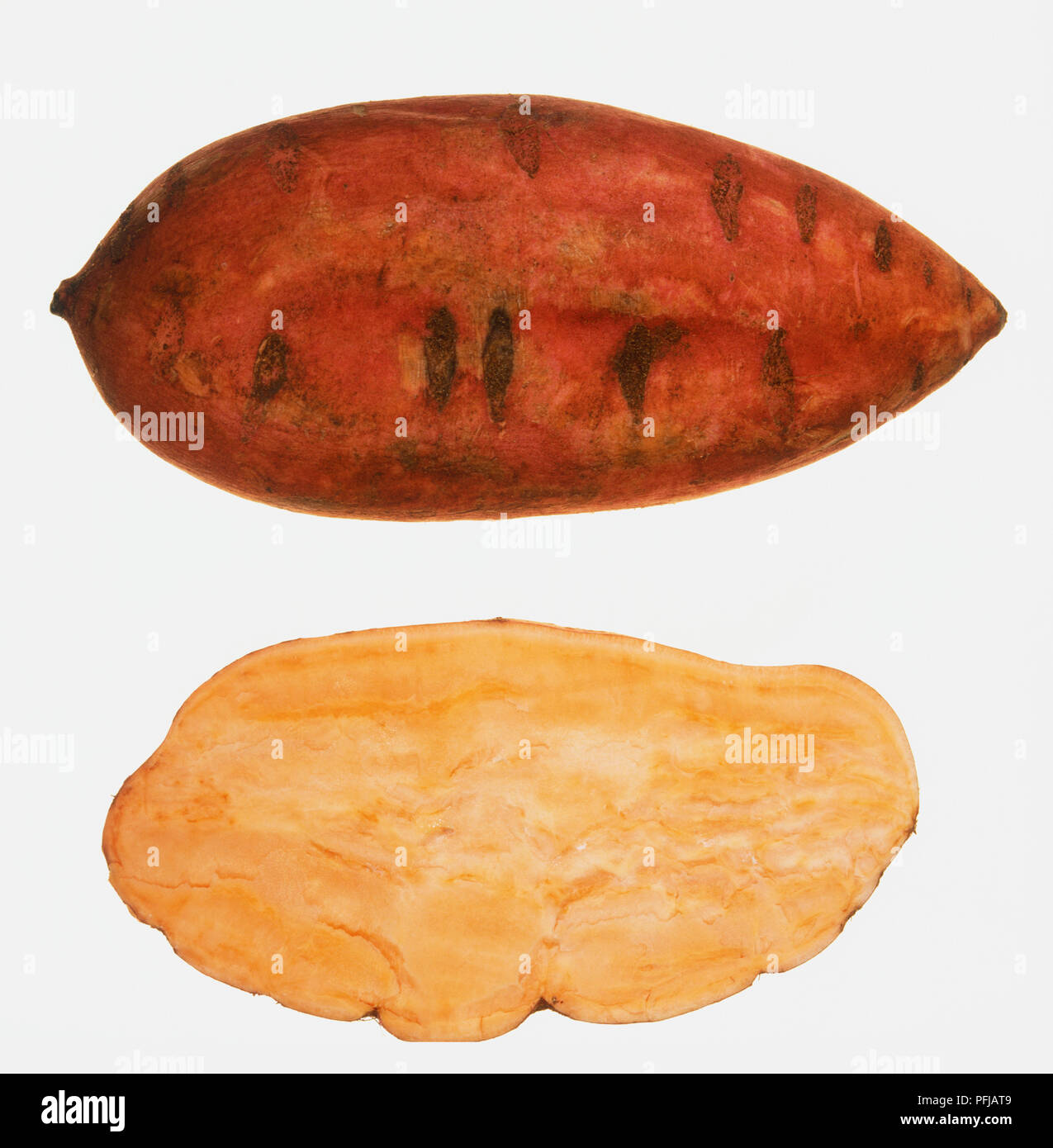 Sweet potato, whole and half Stock Photo - Alamy