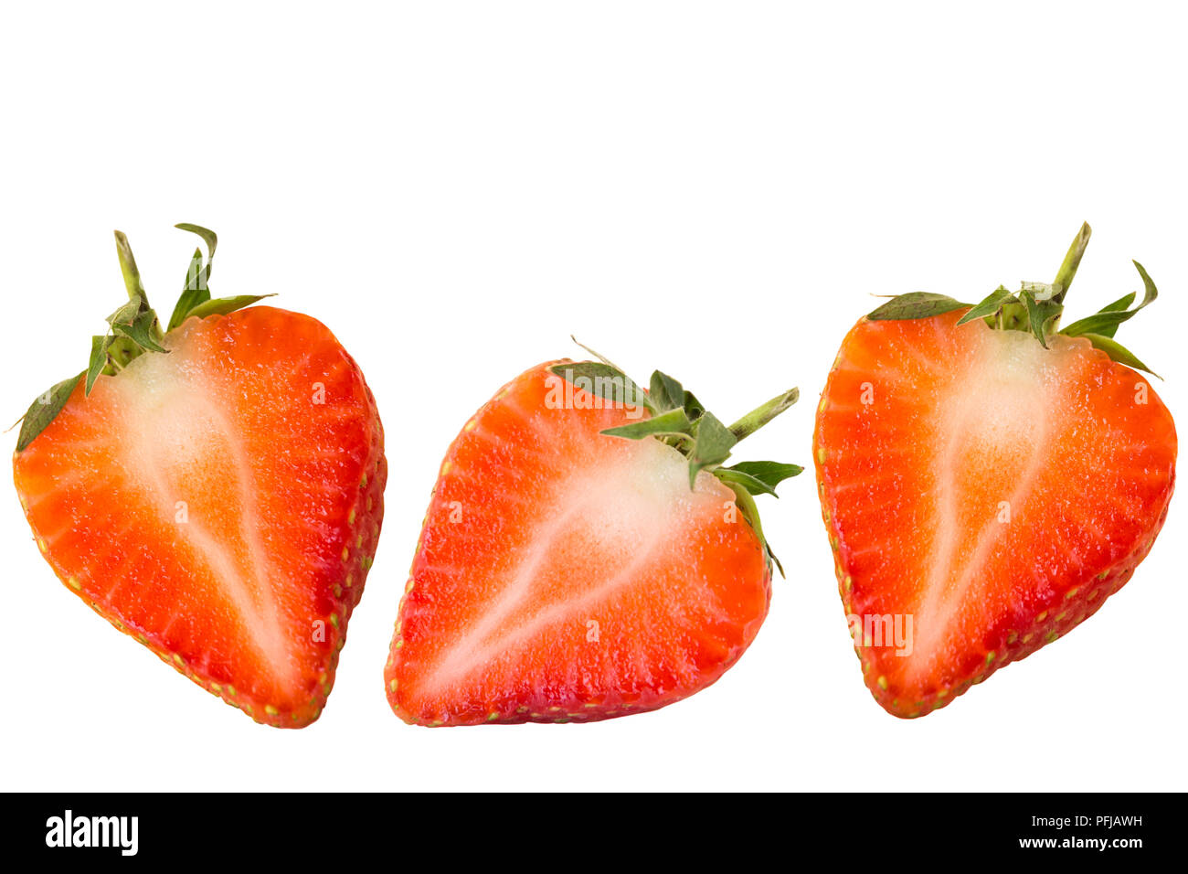 Strawberry cut in half of isolated on white background Stock Photo - Alamy