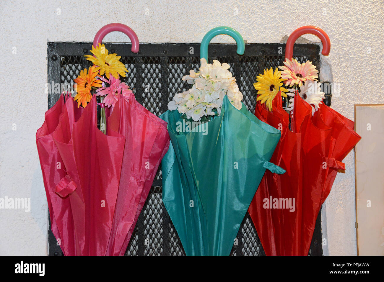 Three umbrellas hi-res stock photography and images - Alamy