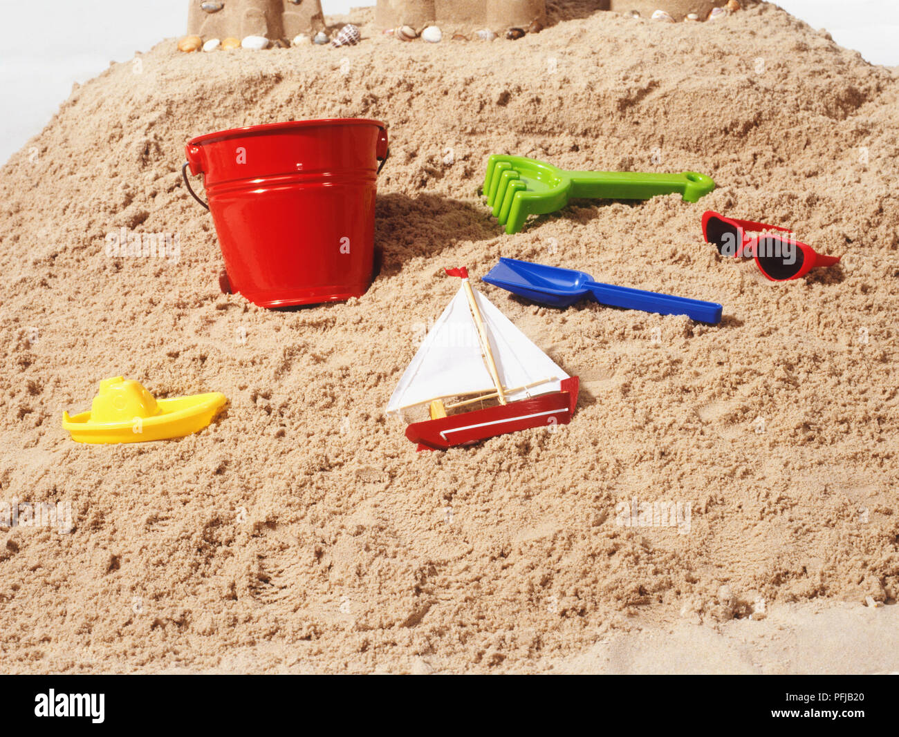 Plastic toy boat in sand hi-res stock photography and images - Alamy