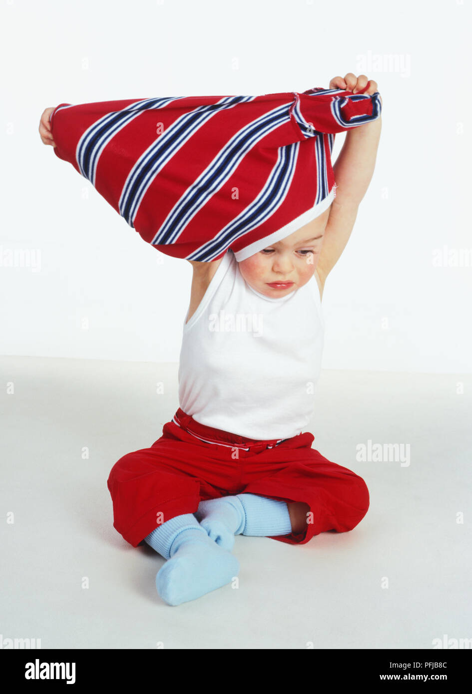 Jumper over head hi-res stock photography and images - Alamy