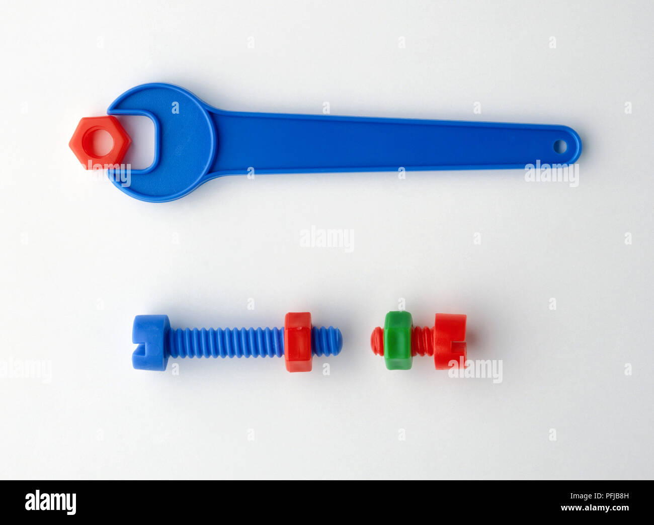 Plastic spanner, nuts and bolts Stock Photo - Alamy