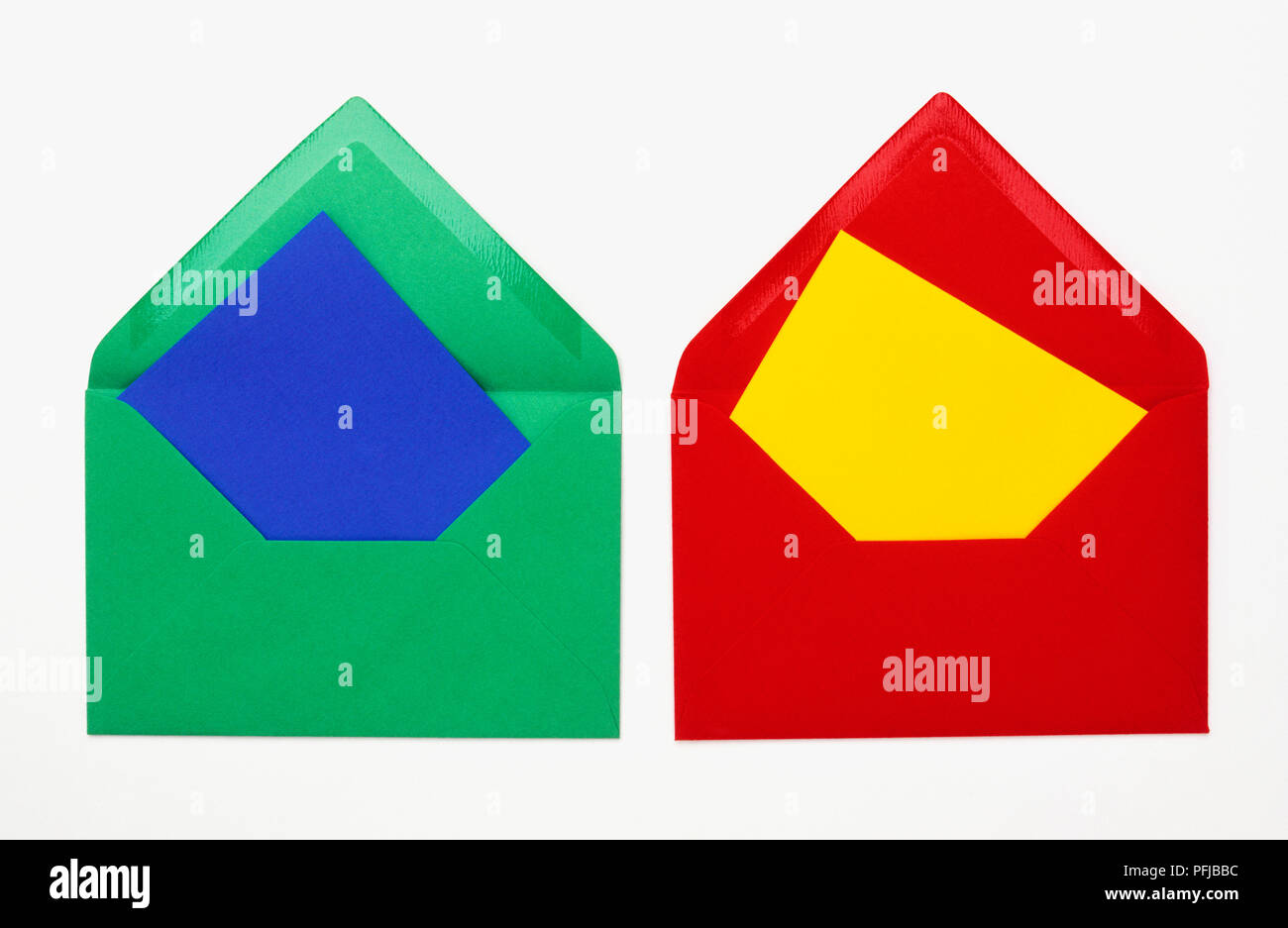 Two colourful open envelopes with notes inside, front view Stock Photo ...