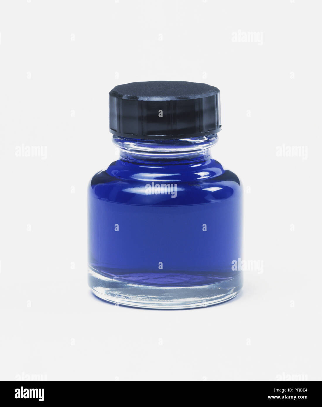 Bottle of blue liquid Stock Photo - Alamy