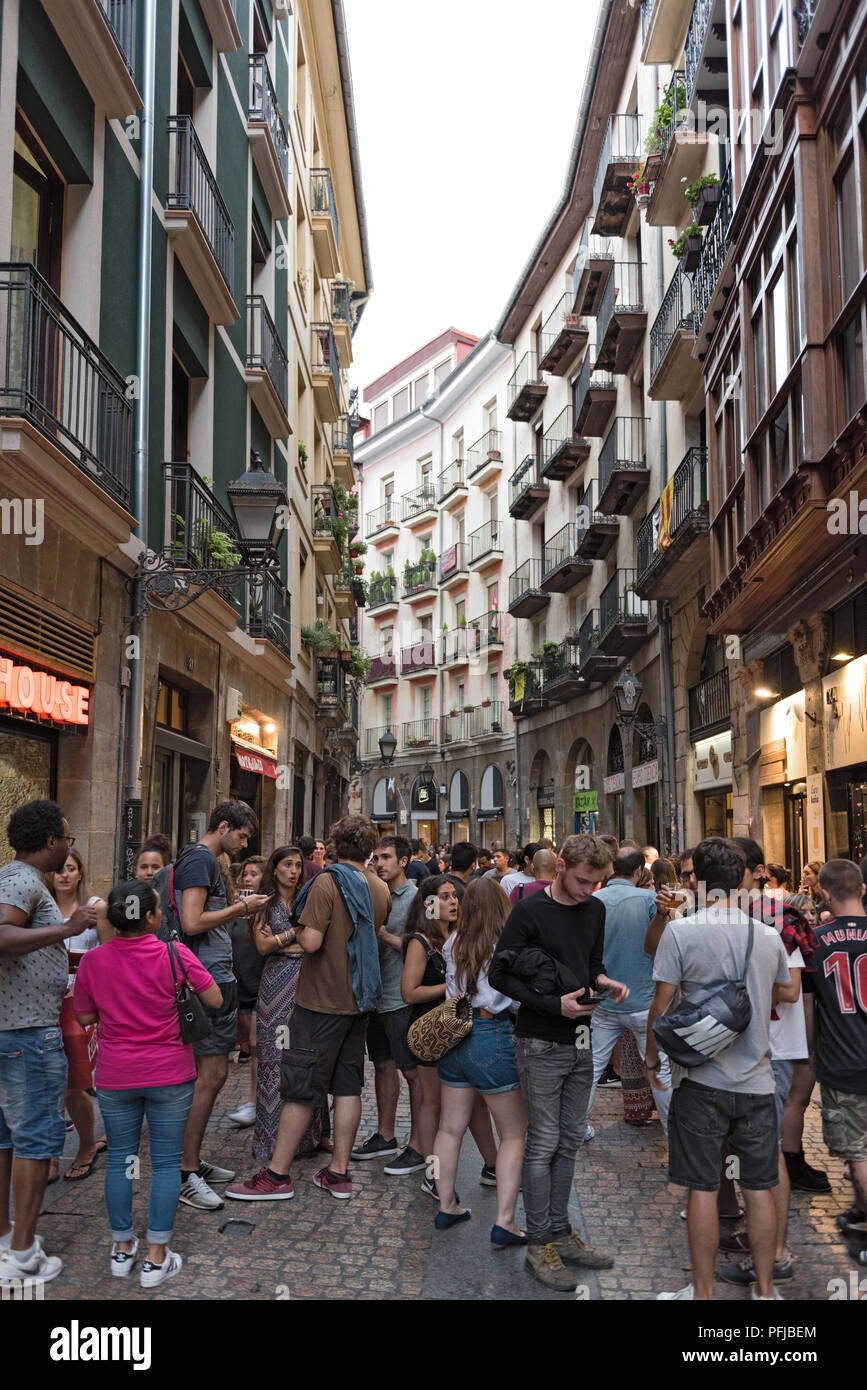 People in the streets and bars of the historic city of Bilbao, Spain ...