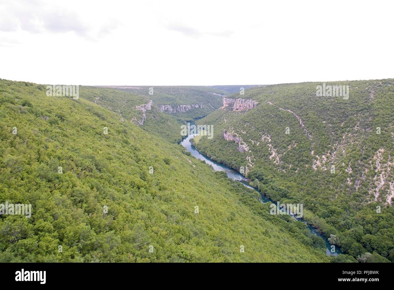 Croatia, Krka National Park, River Krka winding through lush gorge ...