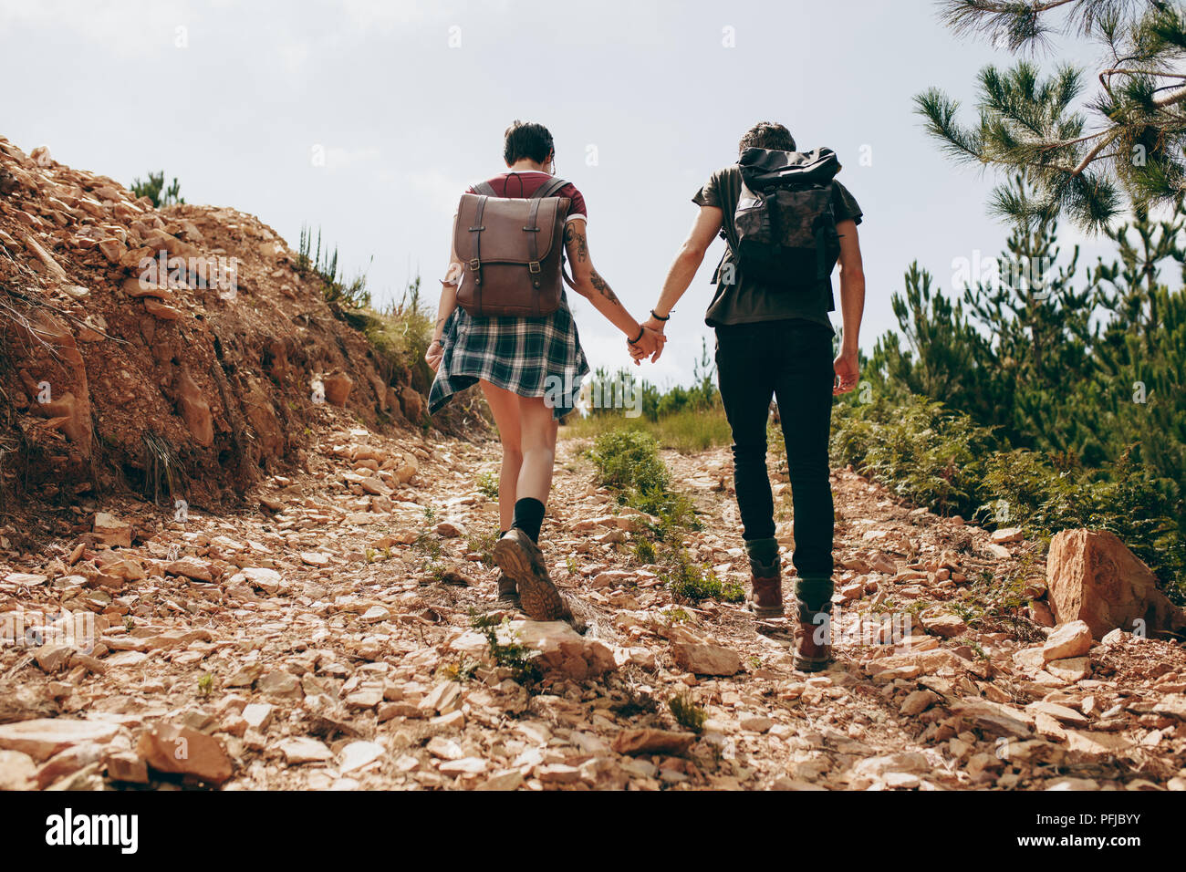 People wearing backpacks hi-res stock photography and images - Alamy