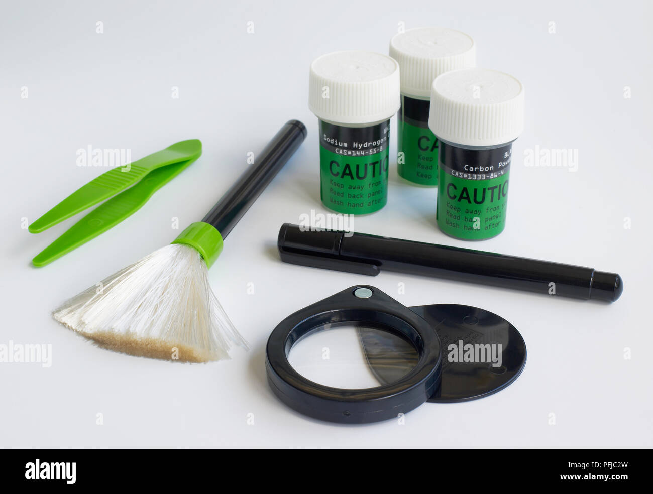 Forensic crime scene kit including brush, loupe, ink, tweezers Stock ...