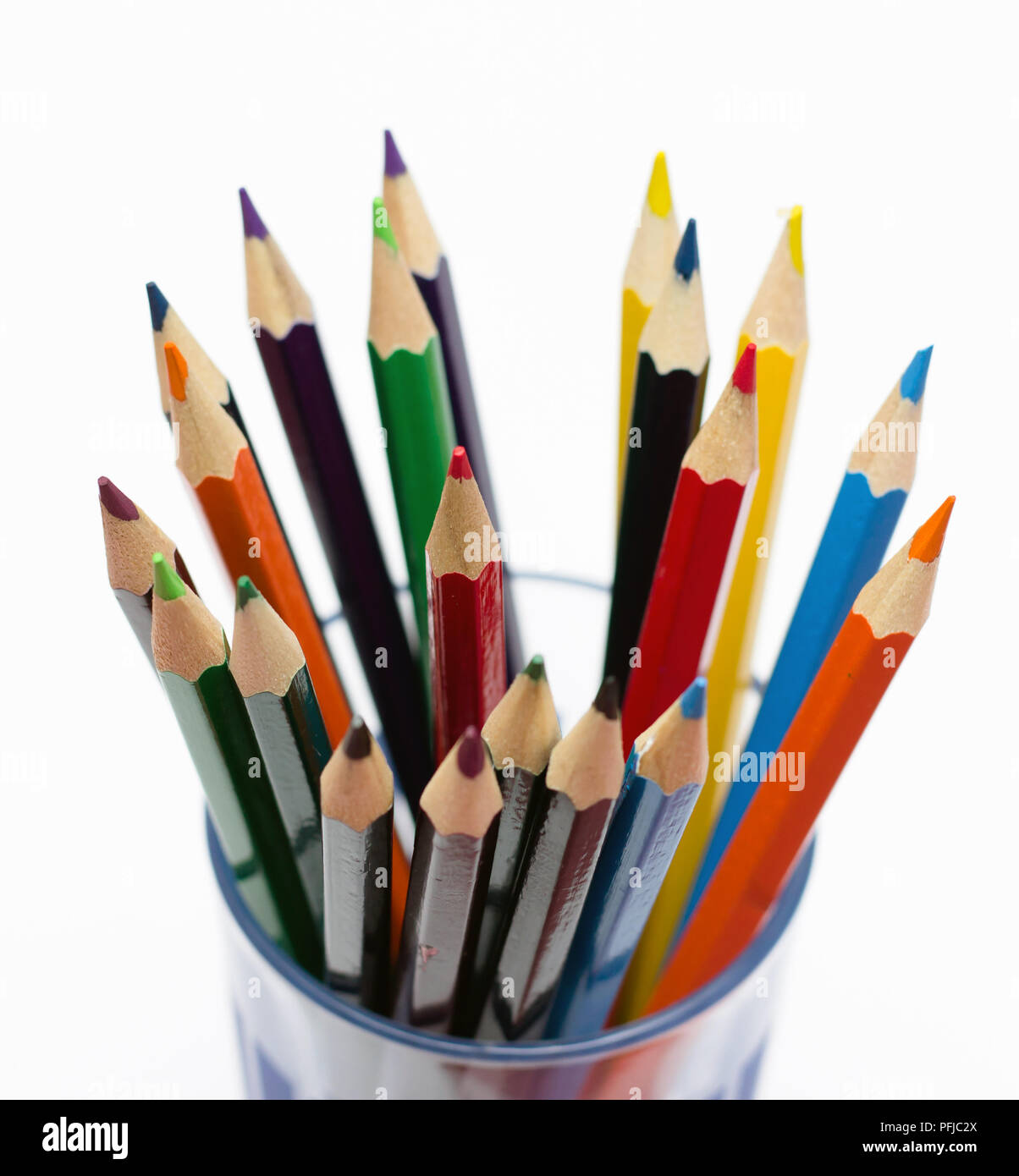 colored pencils in a glass isolated on business background Stock Photo ...