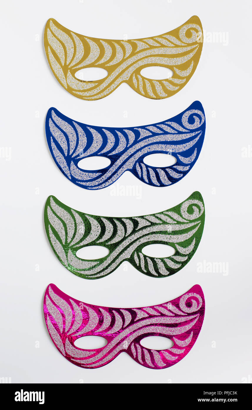Four different coloured masks Stock Photo - Alamy