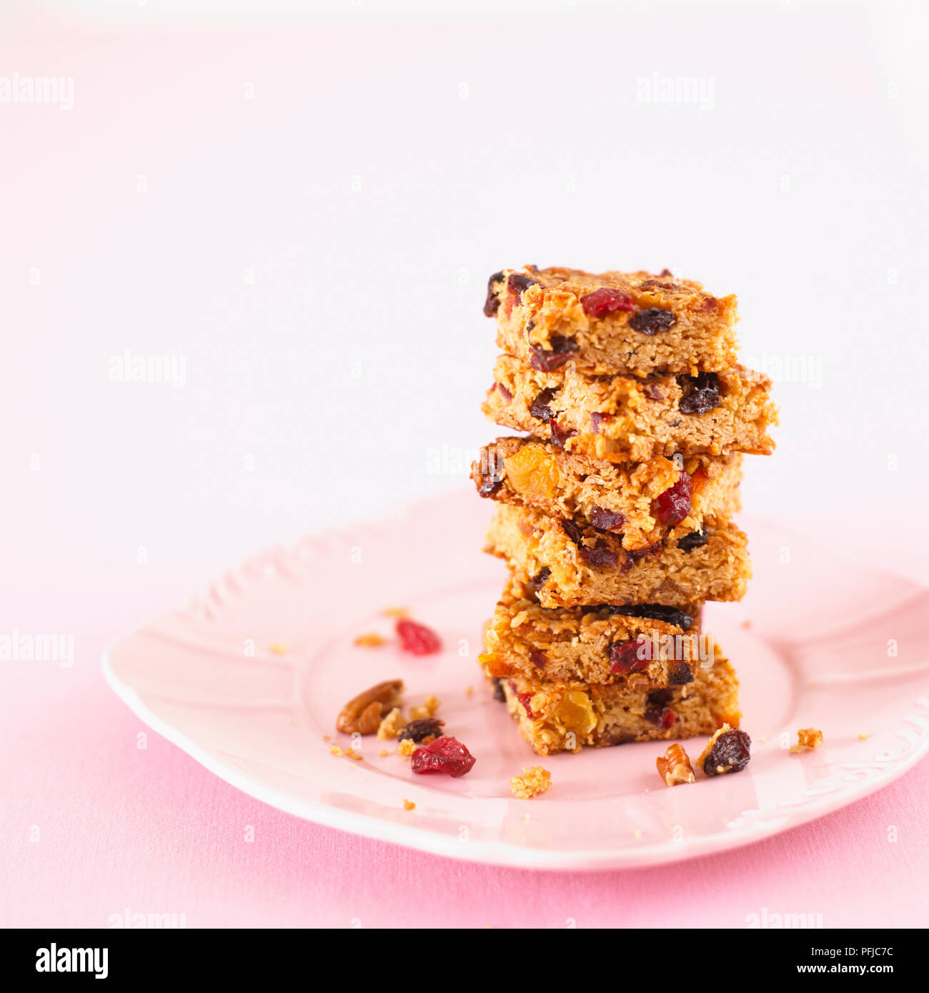 Stack of flapjacks made with oats and dried fruit, on a plate Stock ...