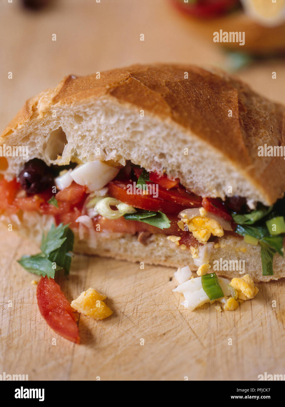 Pan Bagnat, traditional Provencal sandwich of white bread filled with ...