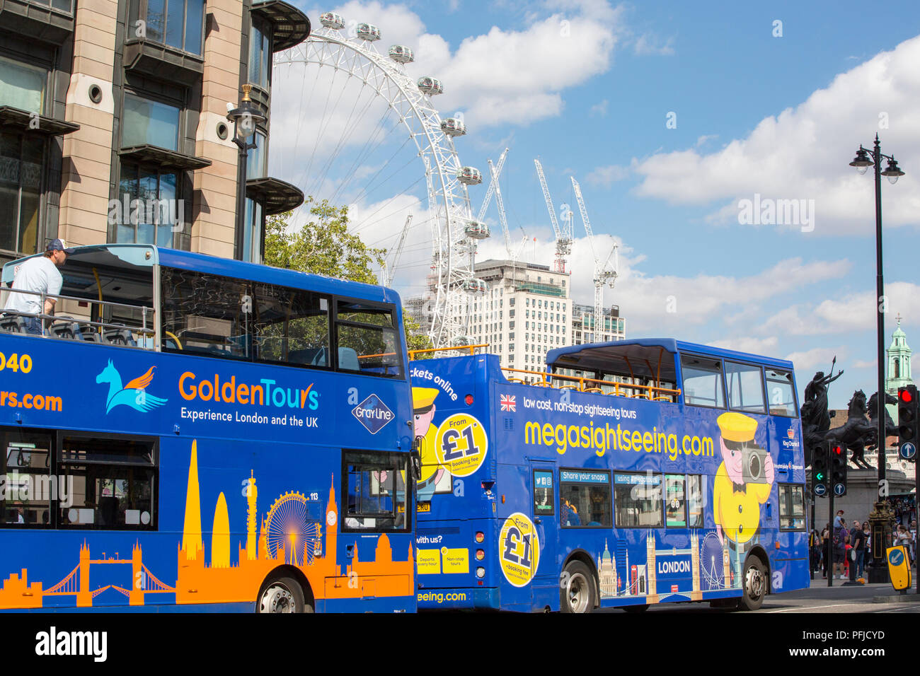 Tour buses approaching Westminster Bridge in London, UK Stock Photo - Alamy
