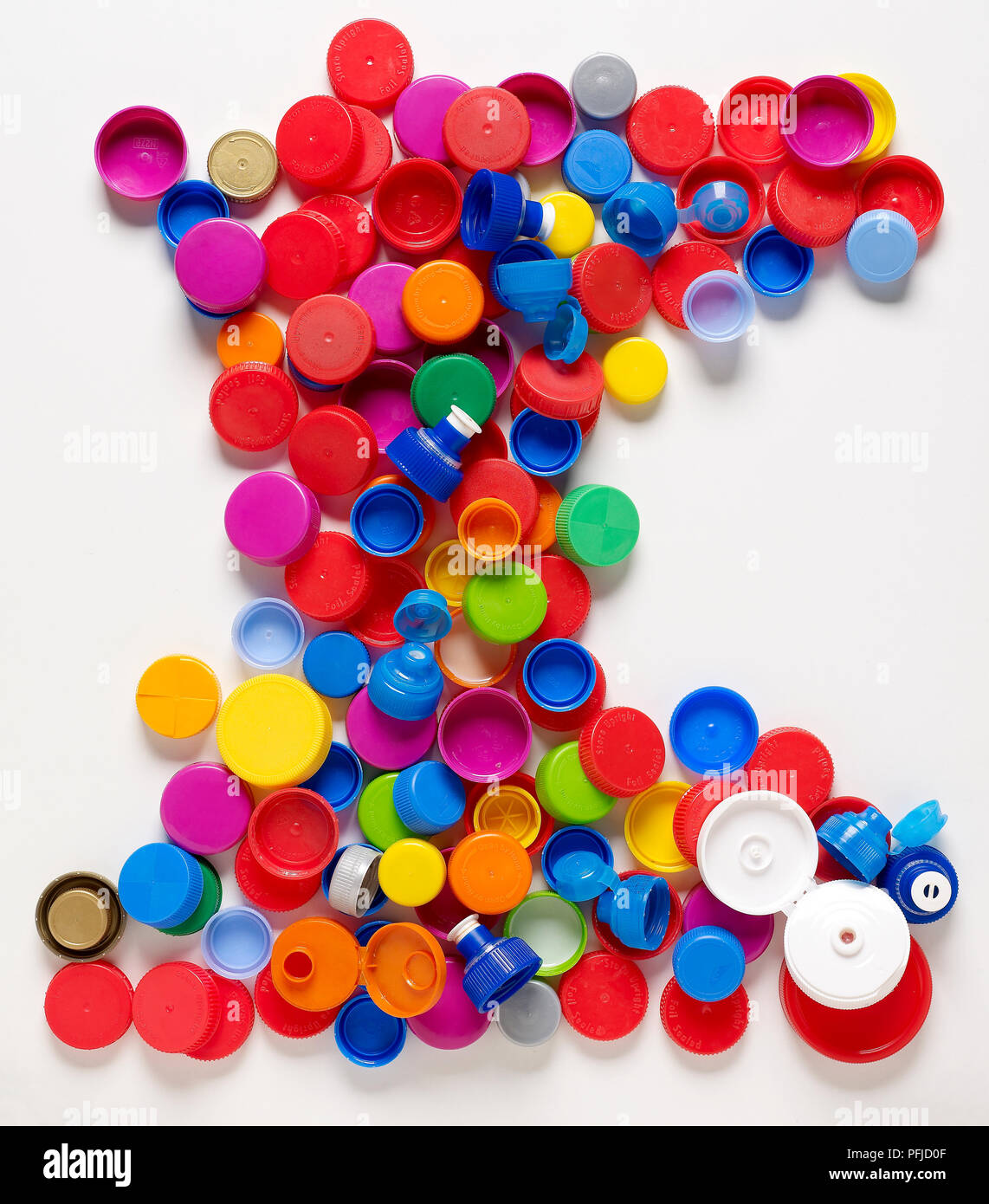 Collection of multi coloured plastic bottle caps Stock Photo - Alamy