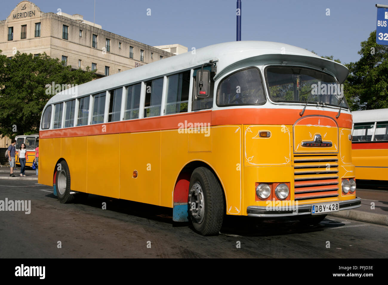 Malta, Valletta, yellow bus at bus station Stock Photo - Alamy