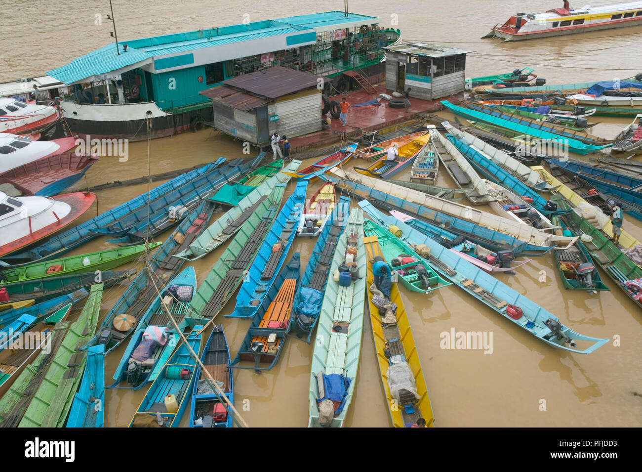 Malaysia, Borneo, Sarawak, Kapit, longboats loaded with goods moored in ...