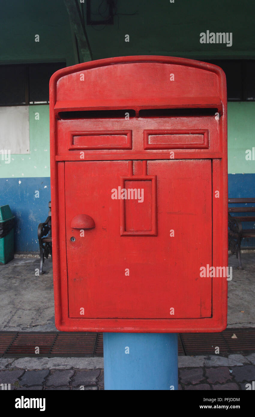 Malaysia, Sabah, red post box in village, close-up Stock Photo - Alamy