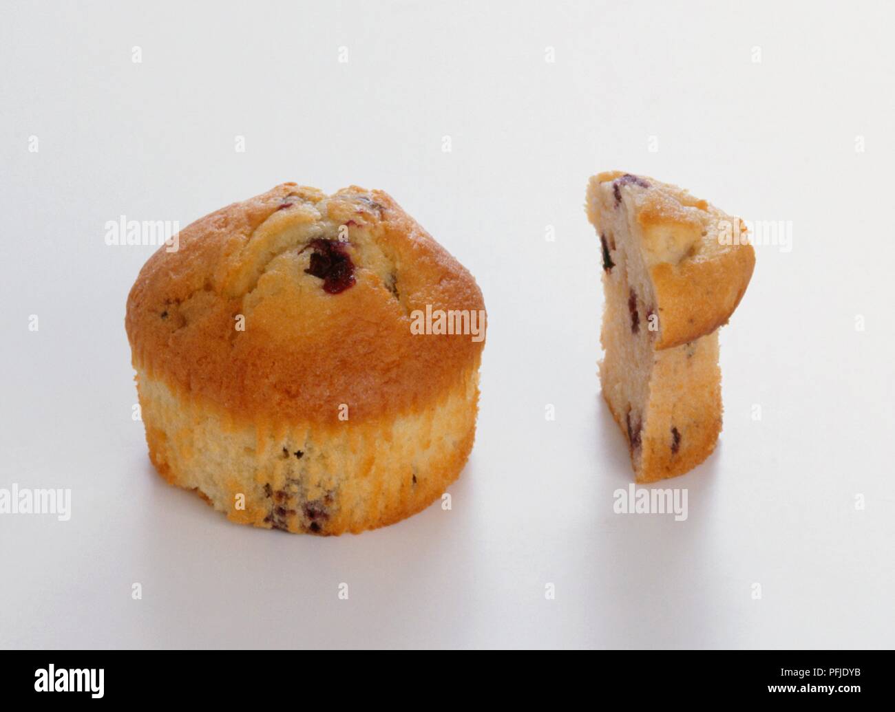Whole blueberry muffin and slice Stock Photo - Alamy