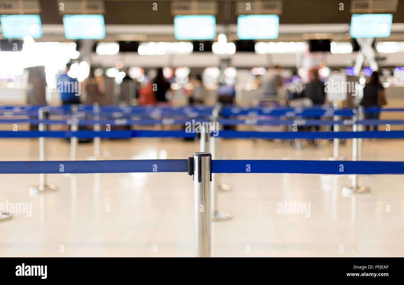 Waiting lines in the airport and security post for passenger check in ...