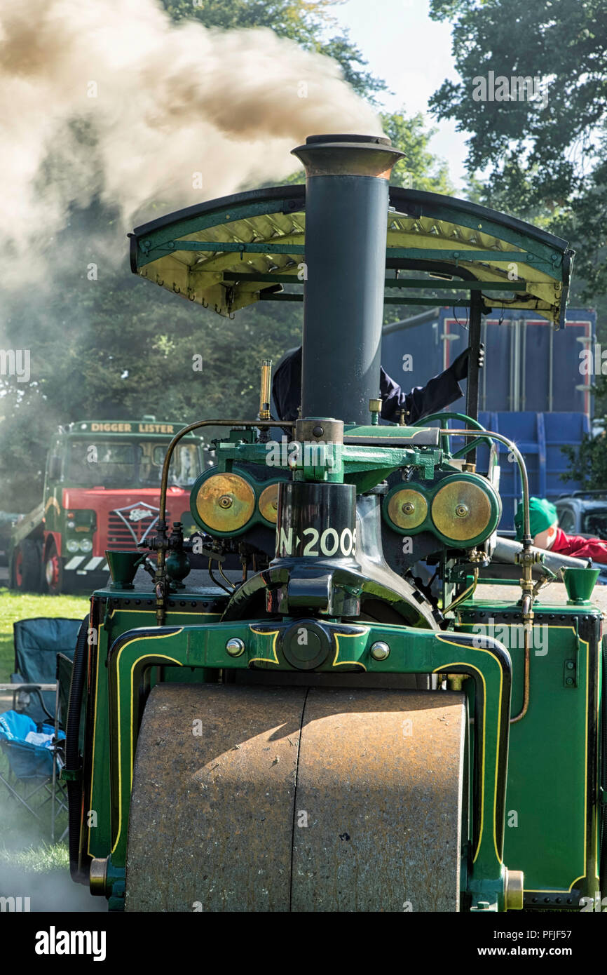 Old Steam Roller at Harewood Steam Fair with clouds of smoke coming out ...