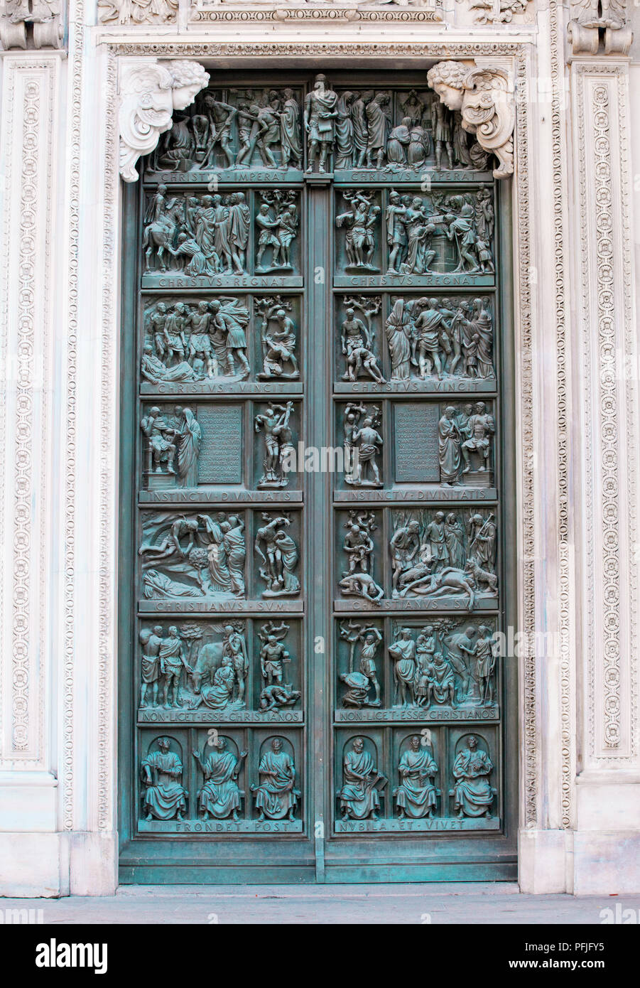 Decorated door of the Milan cathedral, Italy Stock Photo - Alamy