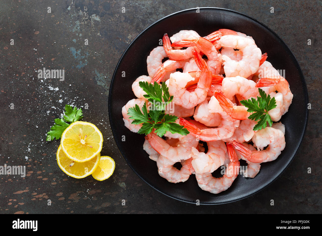 Prawns on plate. Shrimps, prawns. Seafood. Top view. Dark background ...