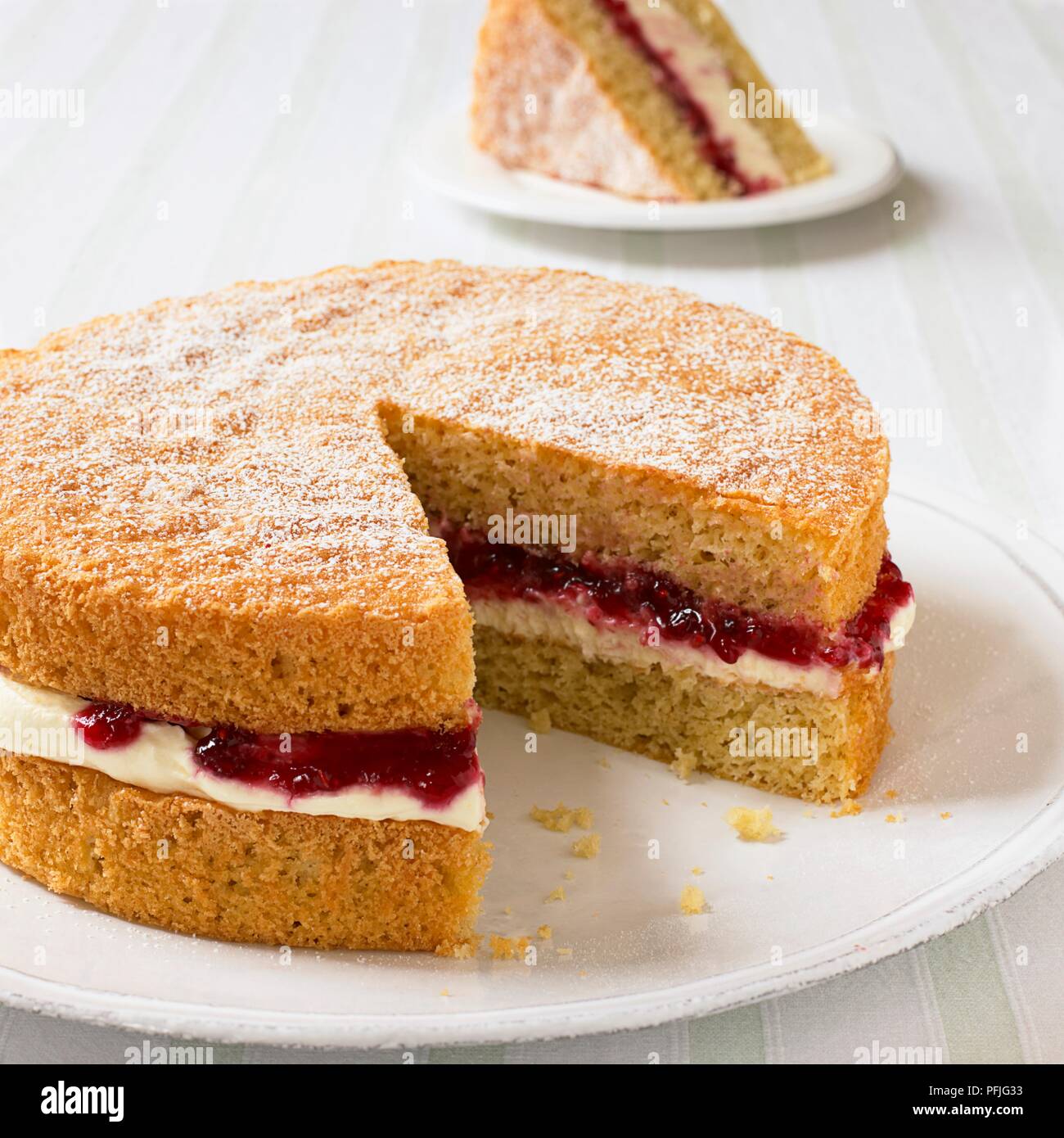 Victoria sponge cake, sliced, close-up Stock Photo - Alamy