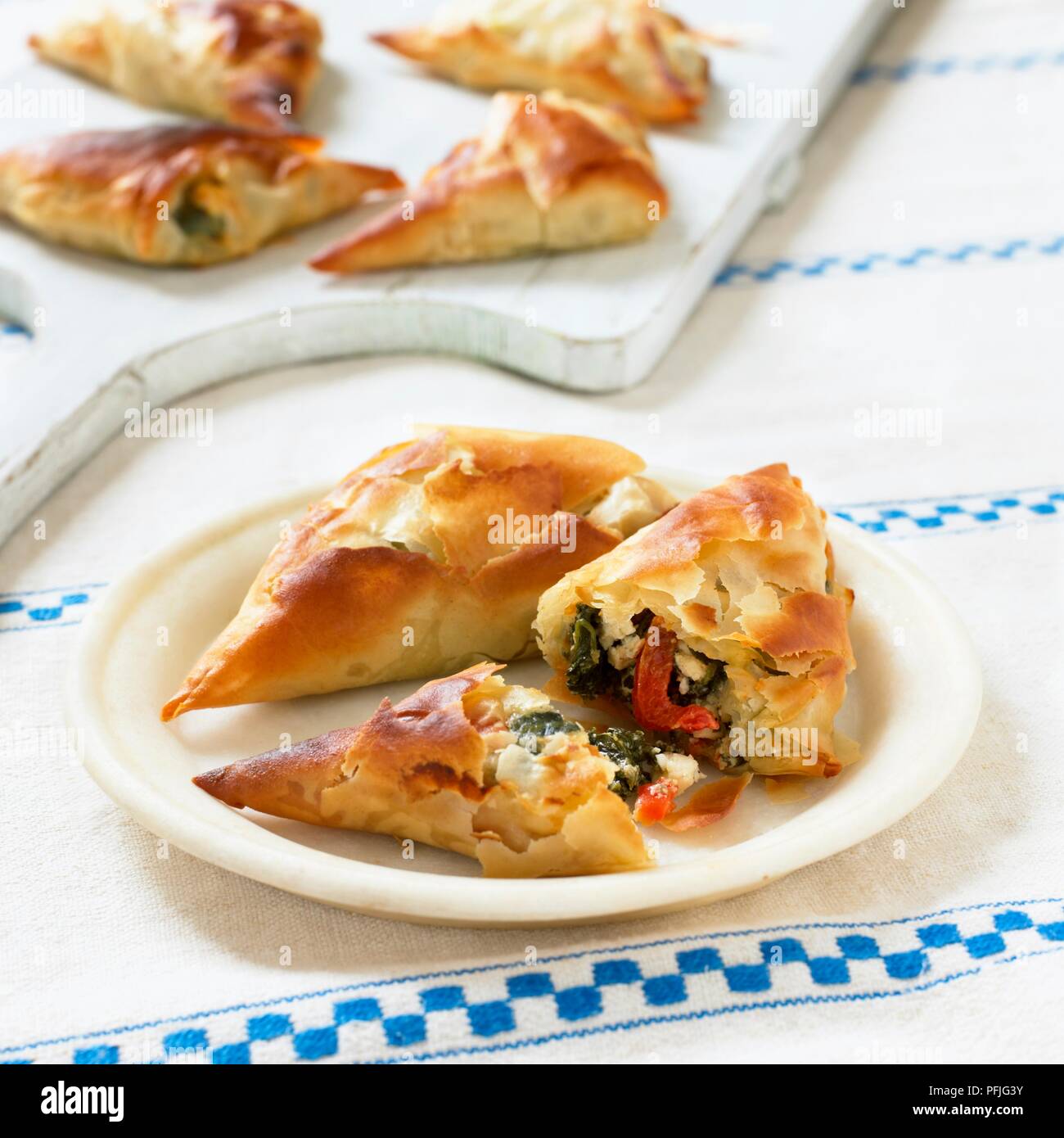 Spinach cheese filo triangle hi-res stock photography and images - Alamy