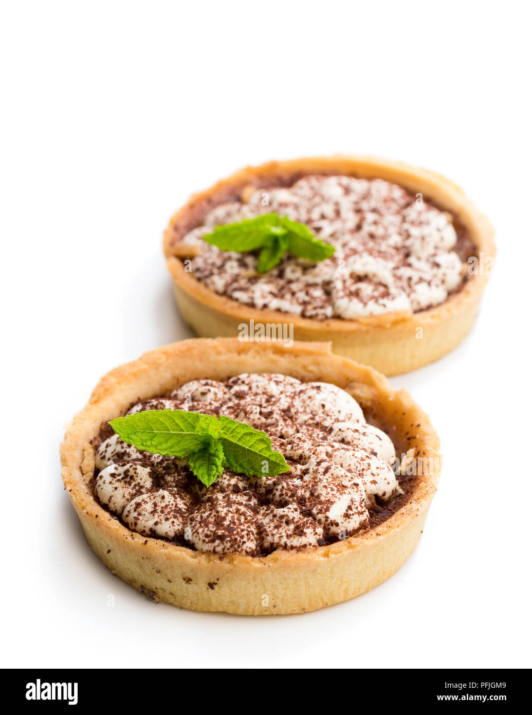 Mini banoffee pie tarts isolated on white Stock Photo - Alamy