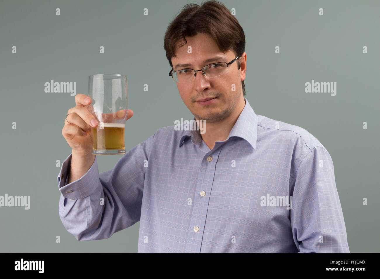 Happy elegant man holding glass hi-res stock photography and images - Alamy