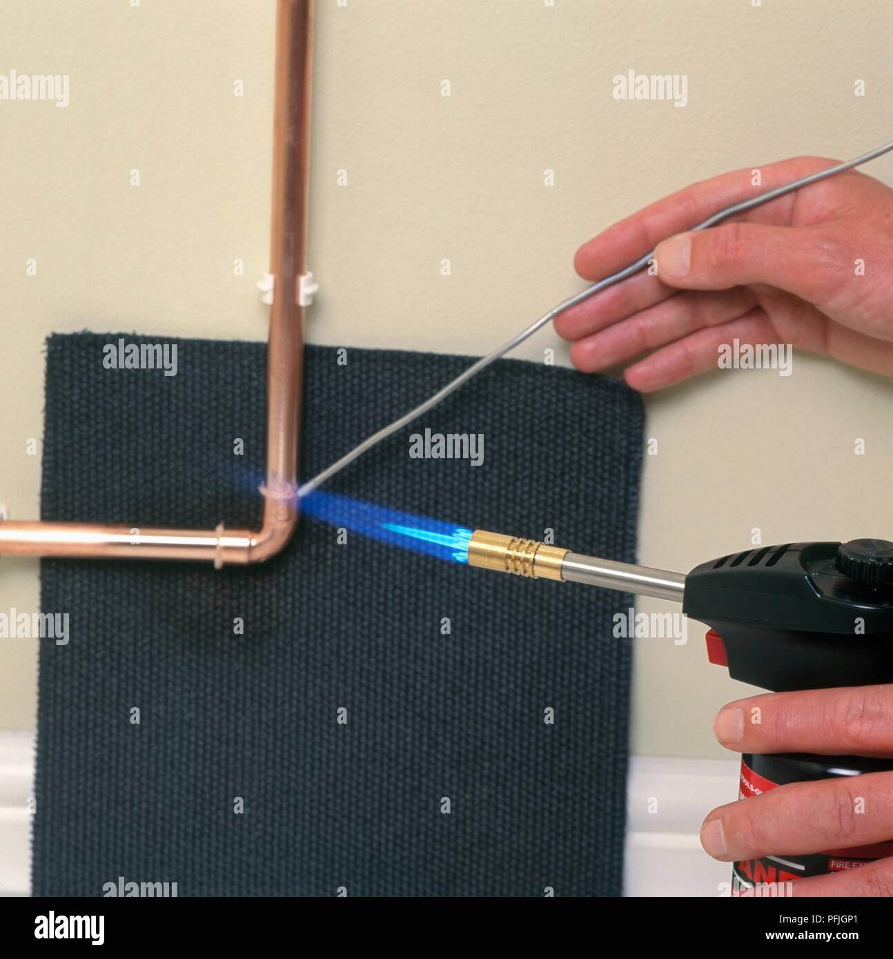 Soldering copper pipe hi-res stock photography and images - Alamy