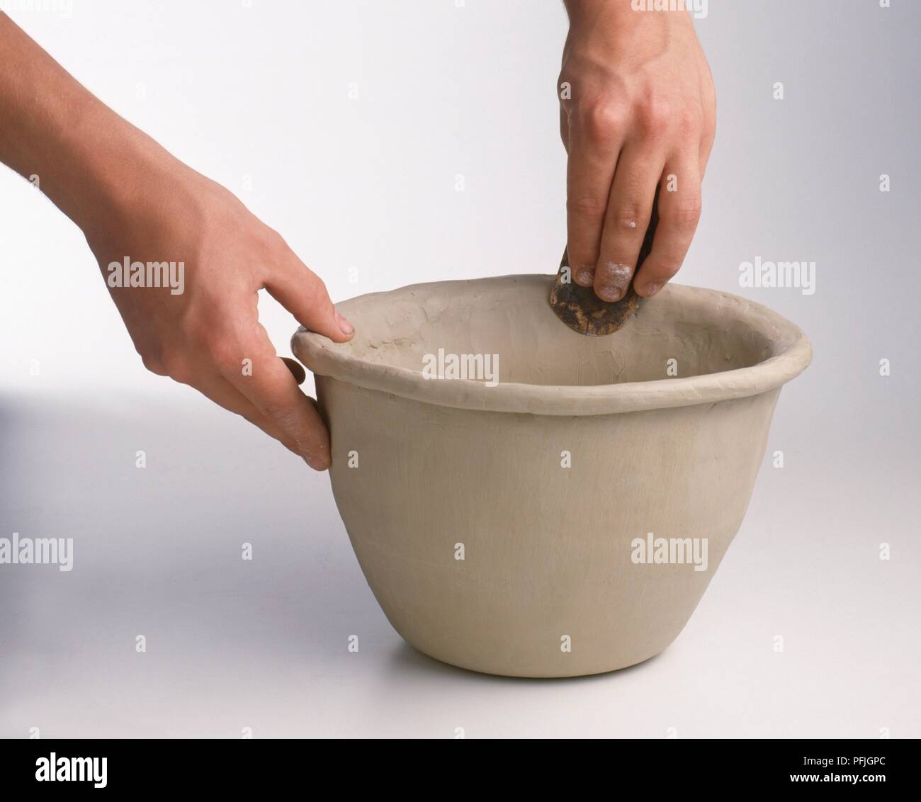 Smoothing clay hi-res stock photography and images - Alamy
