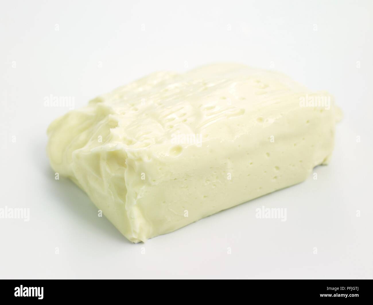 Rectangle of Italian Crescenza cow's milk cheese Stock Photo - Alamy