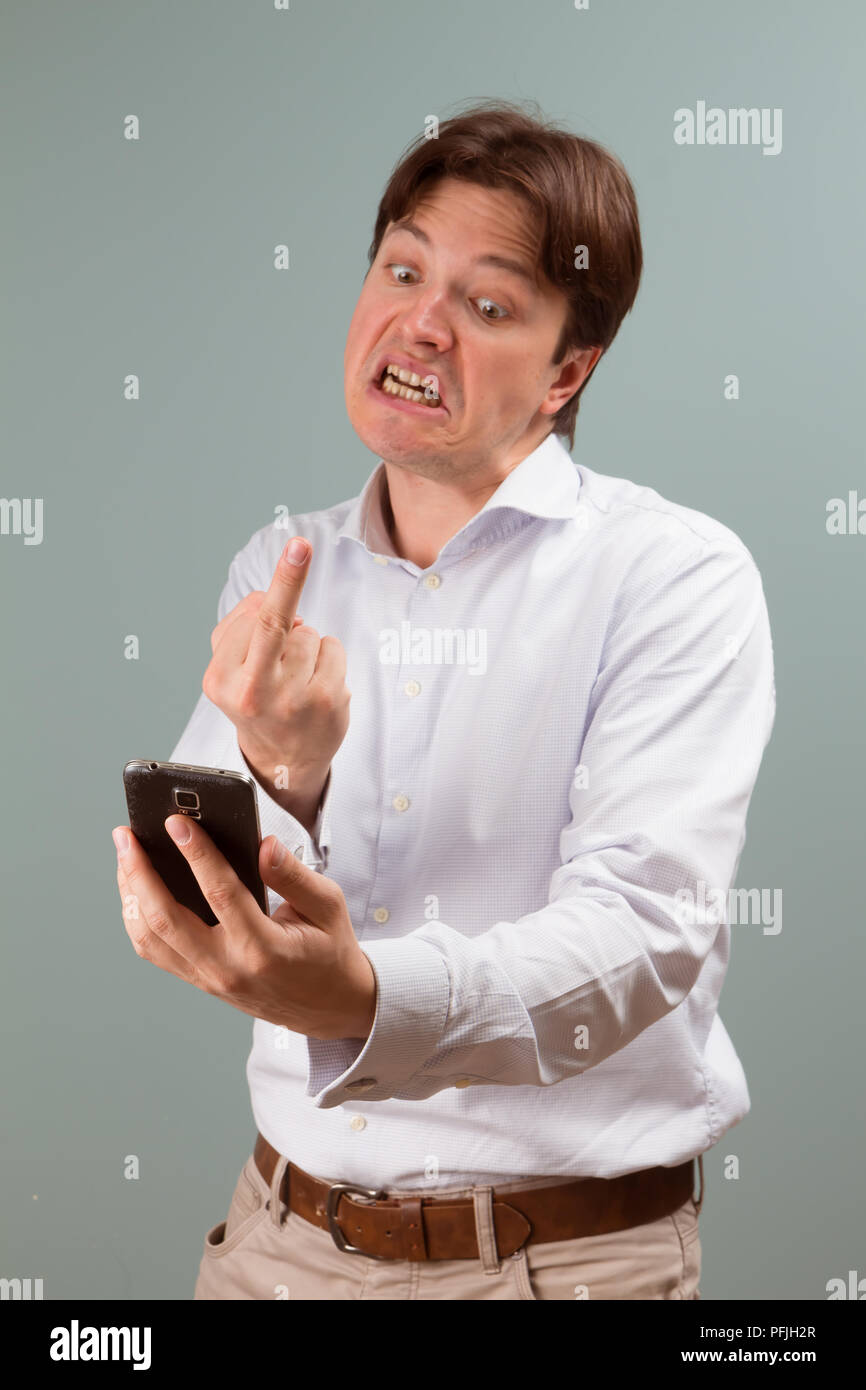 Rude cell phone hi-res stock photography and images - Alamy