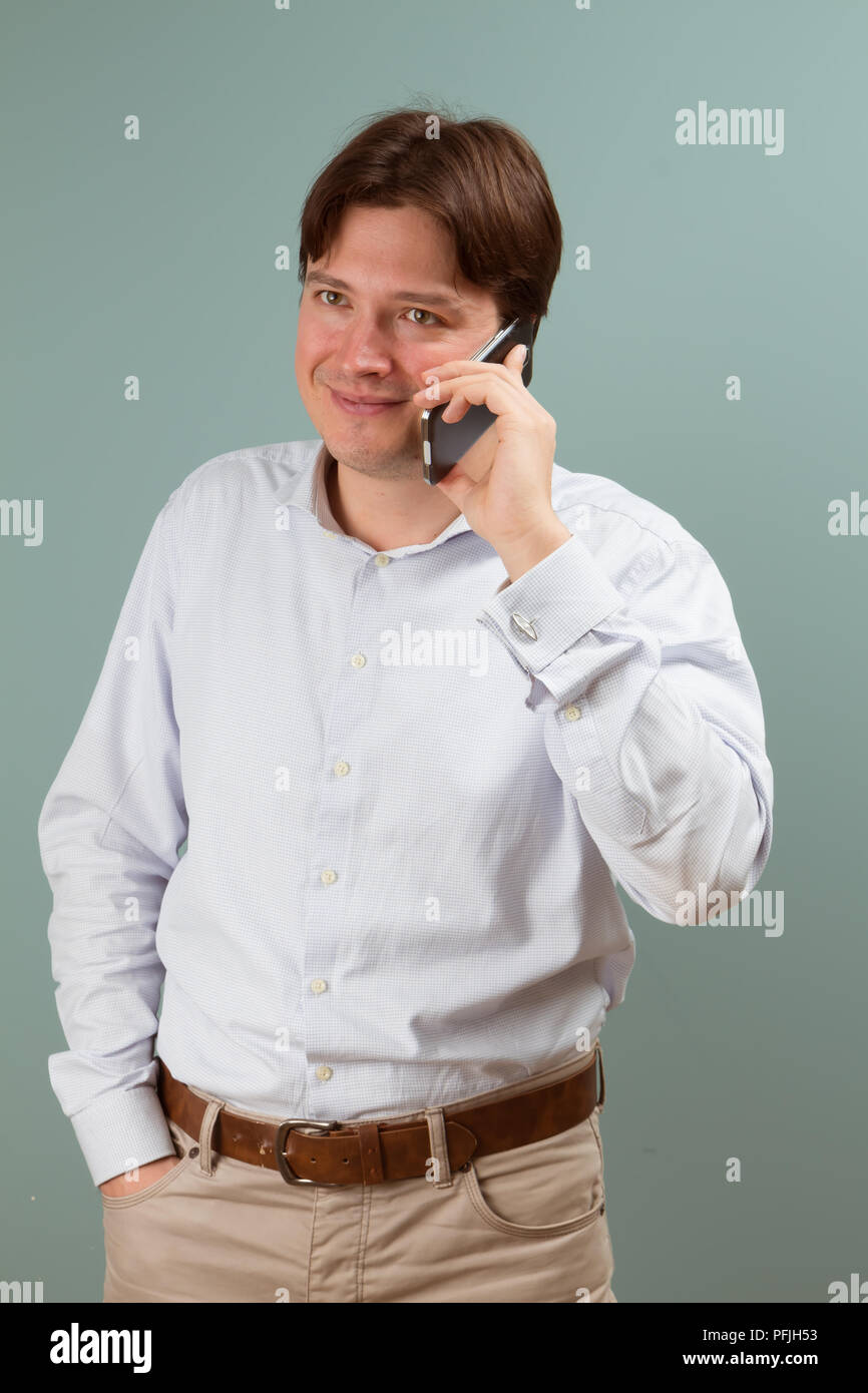Man speaking over telephone hi-res stock photography and images - Alamy