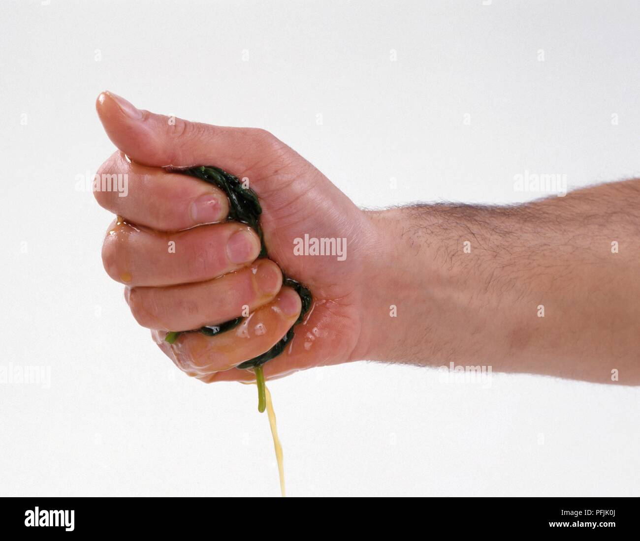 Squeezing water from hi-res stock photography and images - Alamy