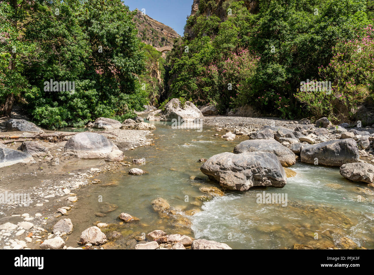 views of il Ponte del diavolo and the Raganello river in Civita inside ...