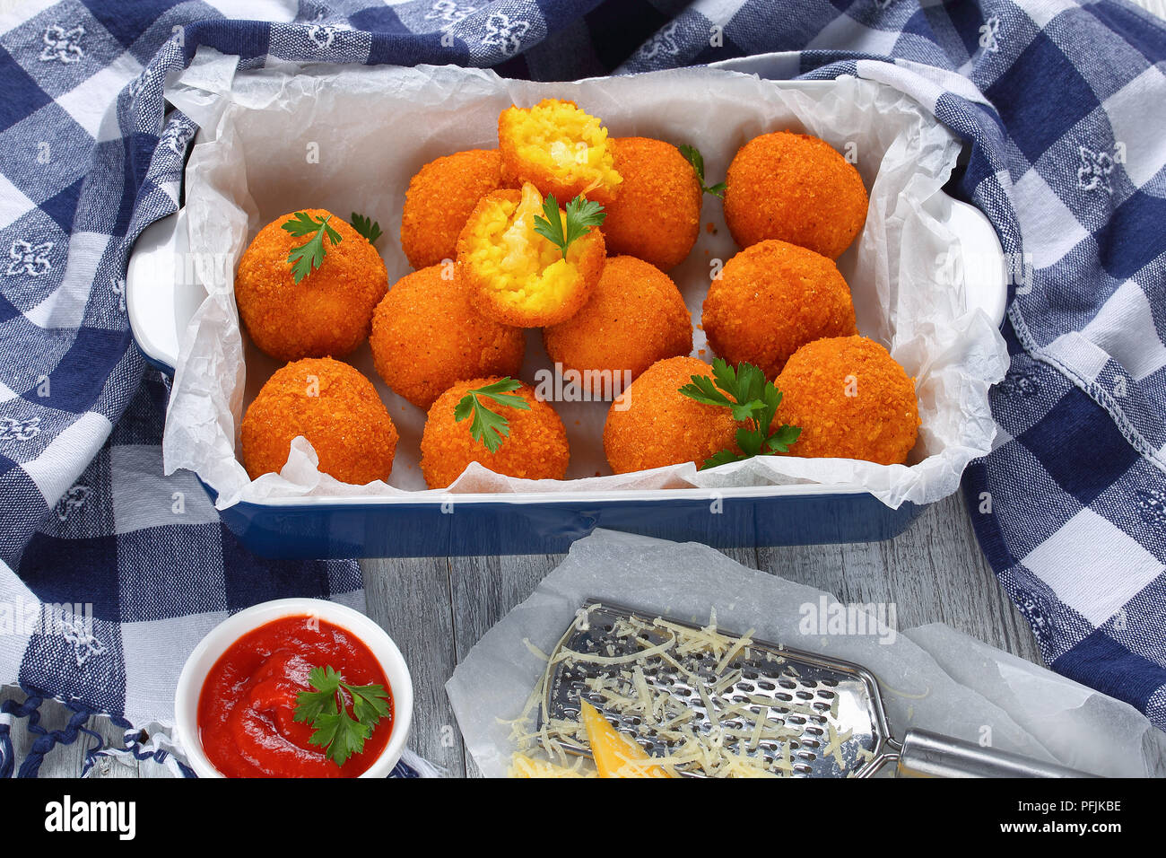 delicious deep fried sicilian arancini - saffron rice balls stuffed ...