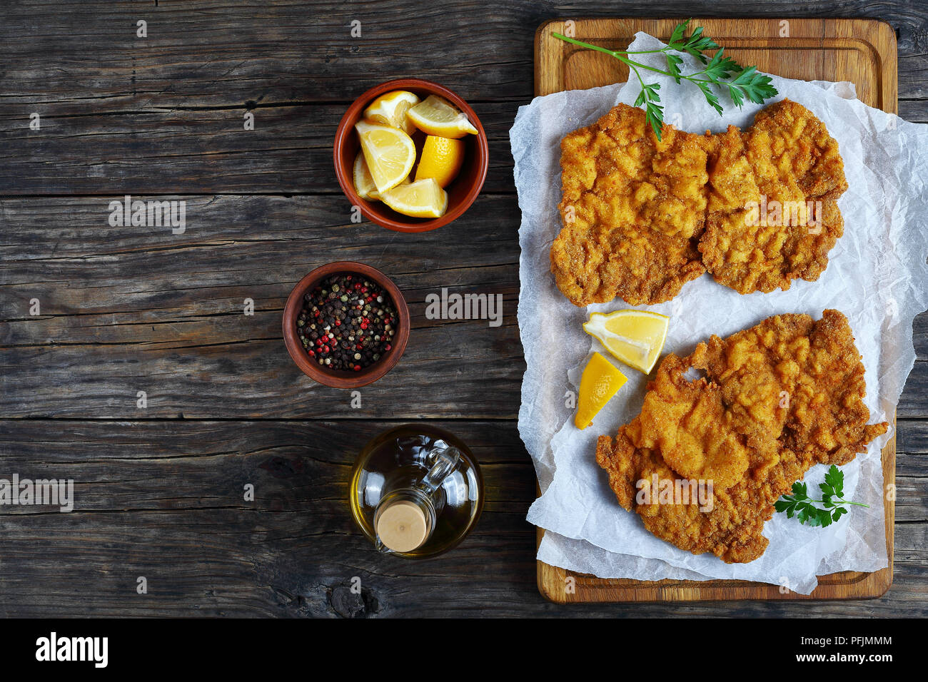 delicious golden brown two Wiener schnitzel prepared from veal slices, butterfly wing cut ...
